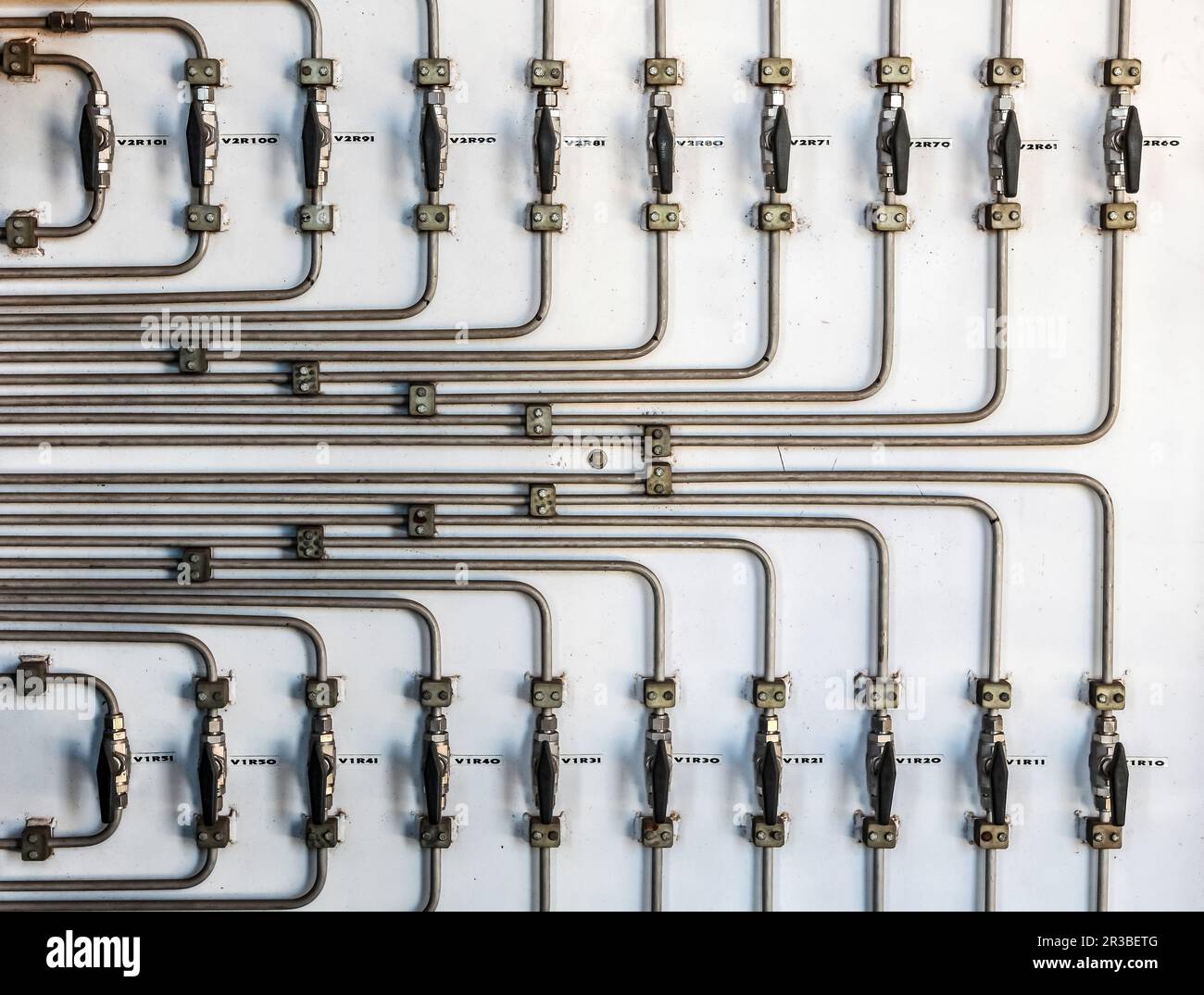 Metal Pipes for cooling and moving liquids Stock Photo - Alamy