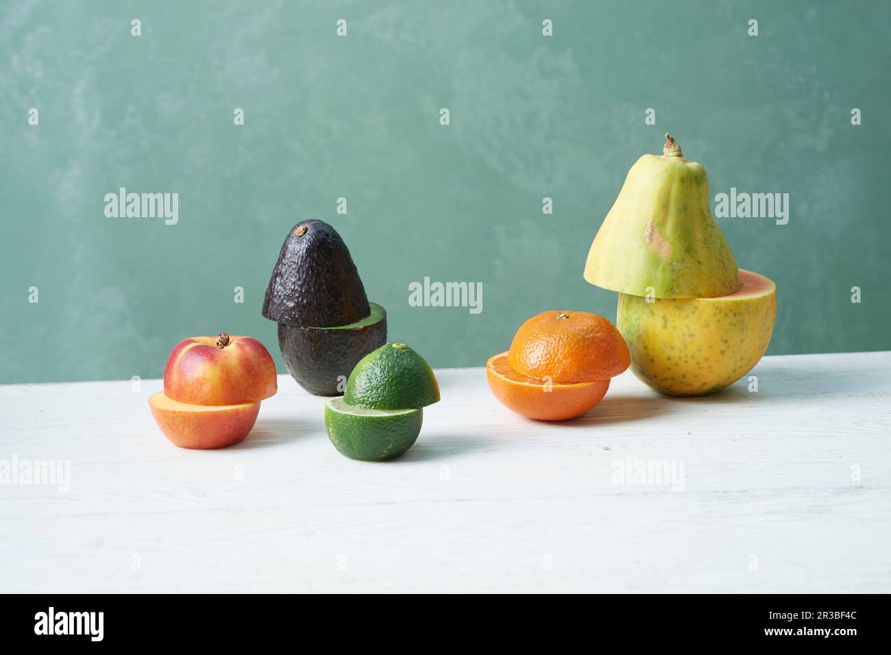 An arrangement of halved fruits Stock Photo - Alamy
