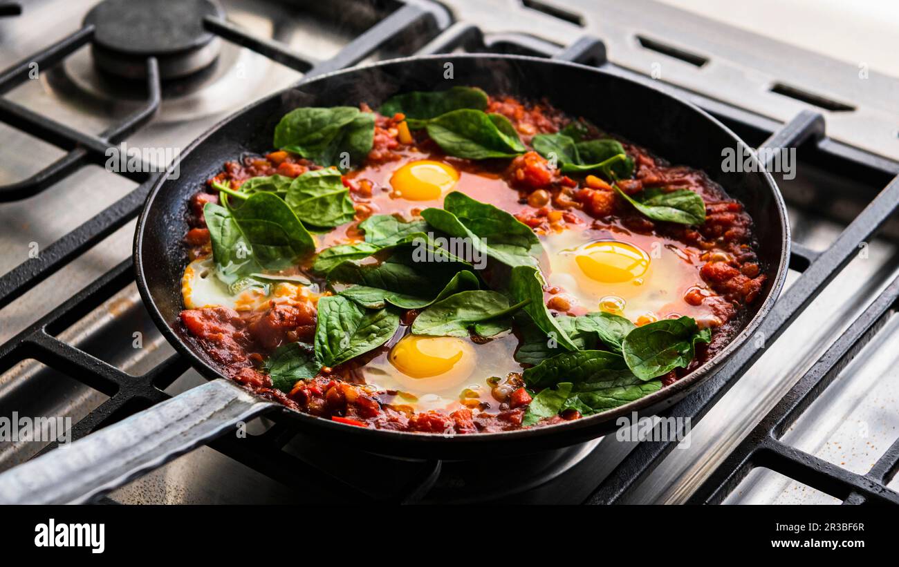 Israeli shakshuka in pan hi-res stock photography and images - Alamy