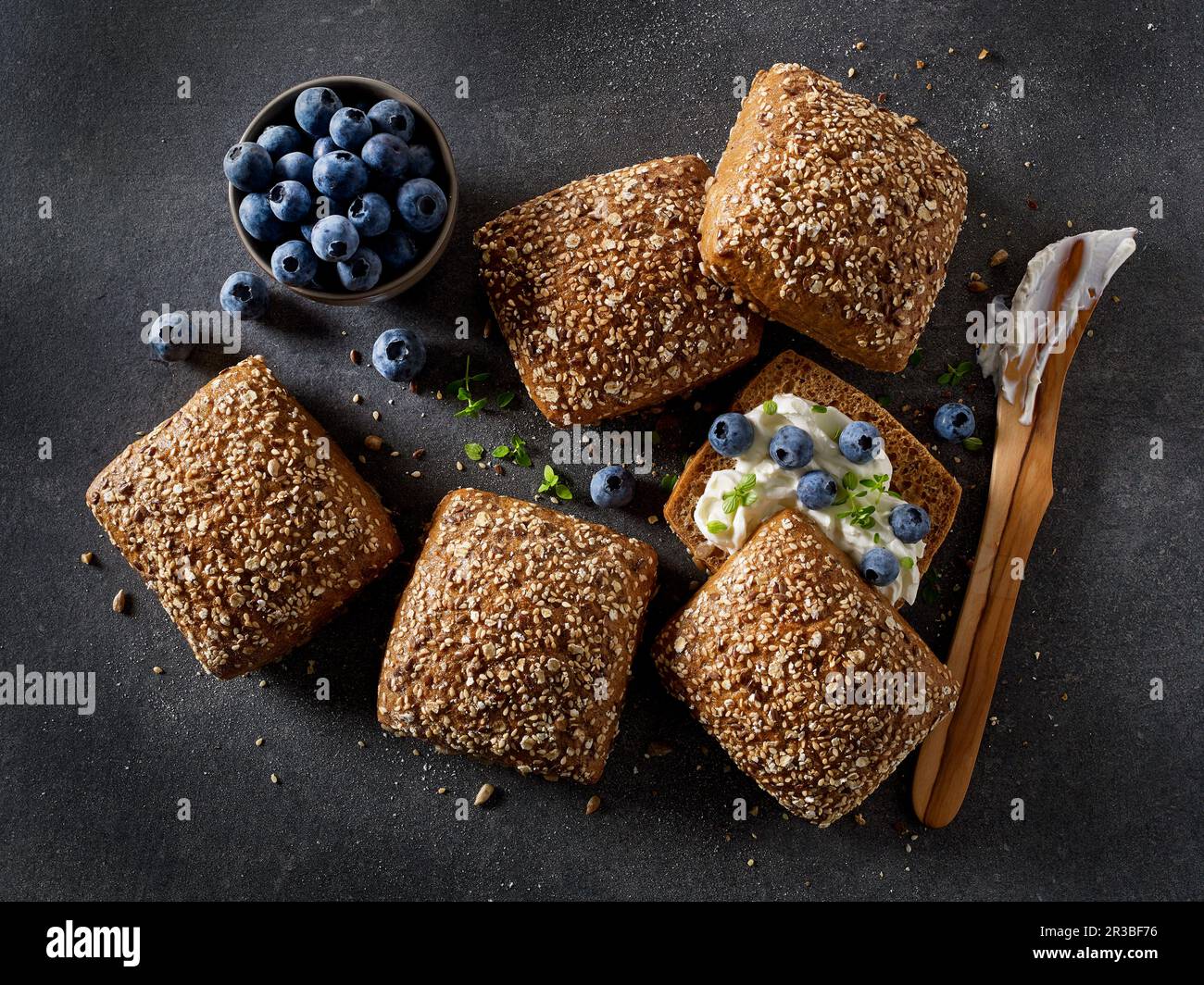 Multi-grain rolls with cream cheese and blueberries Stock Photo - Alamy