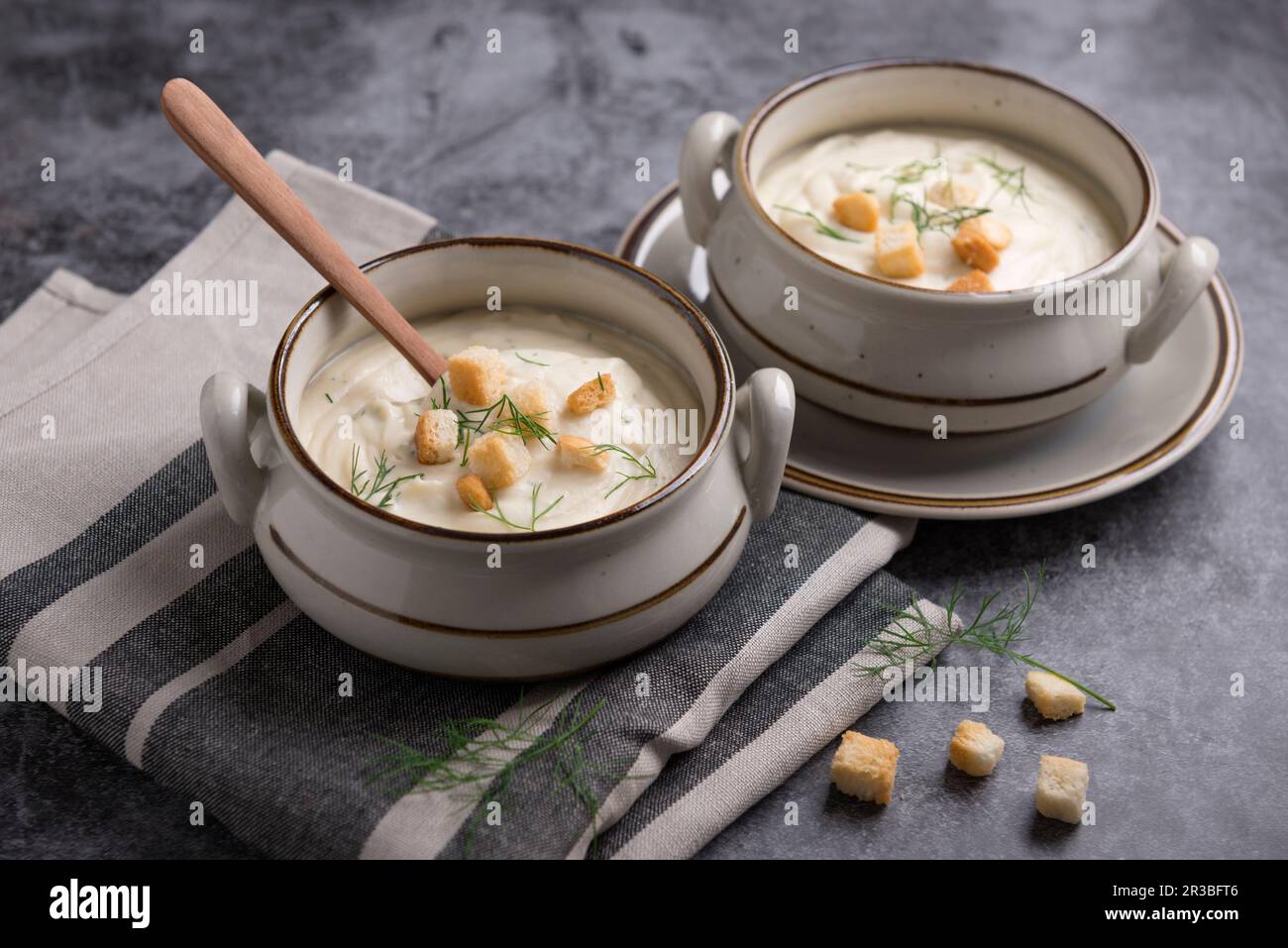 Vegan parsnip cream soup with croutons and dill Stock Photo - Alamy