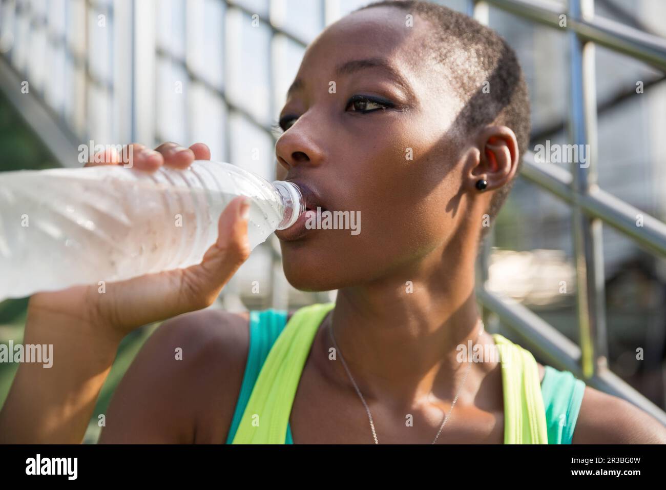 African american woman drinking water hi-res stock photography and ...