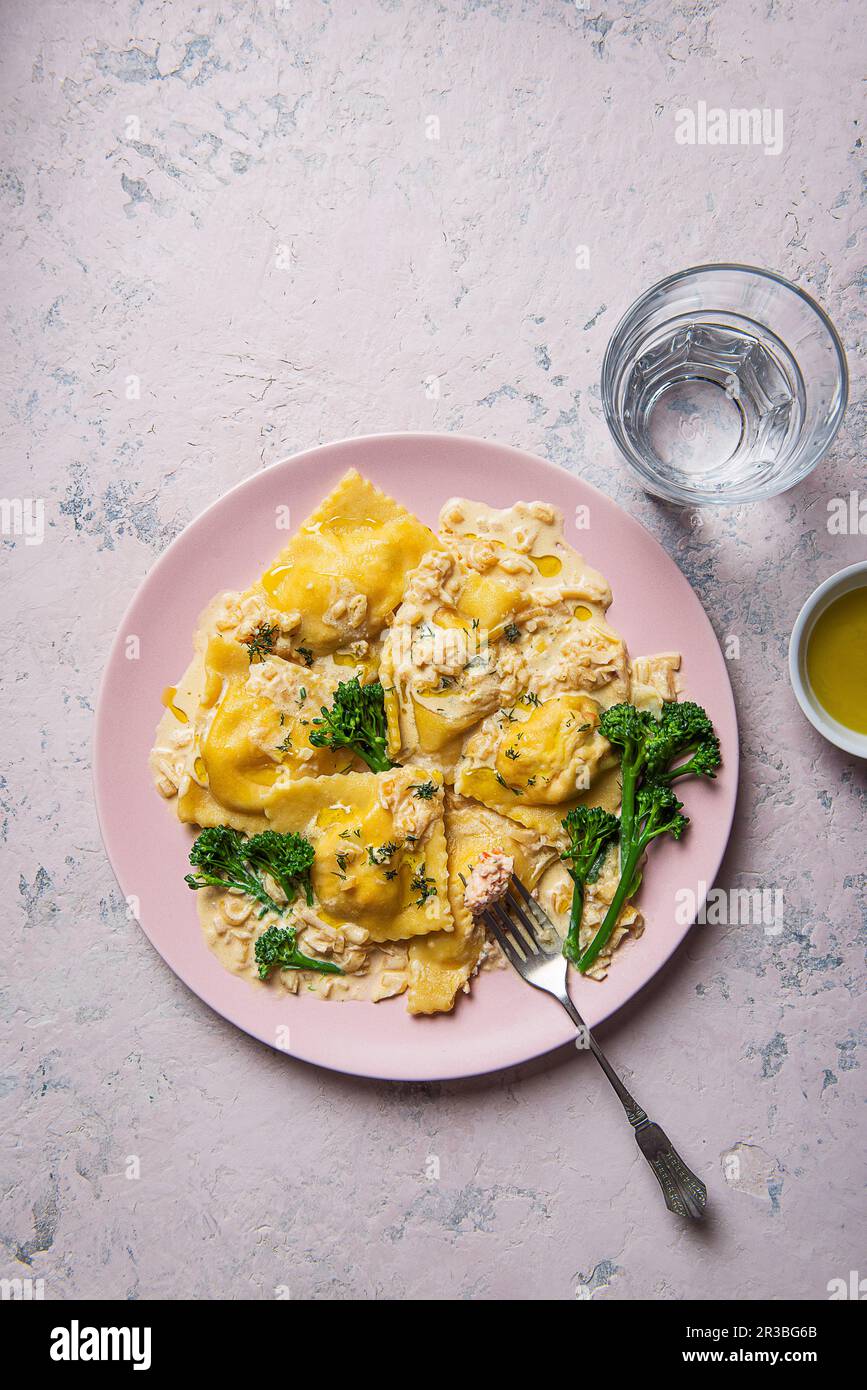 Smoked salmon home made ravioli with white wine cream sauce, dill and ...