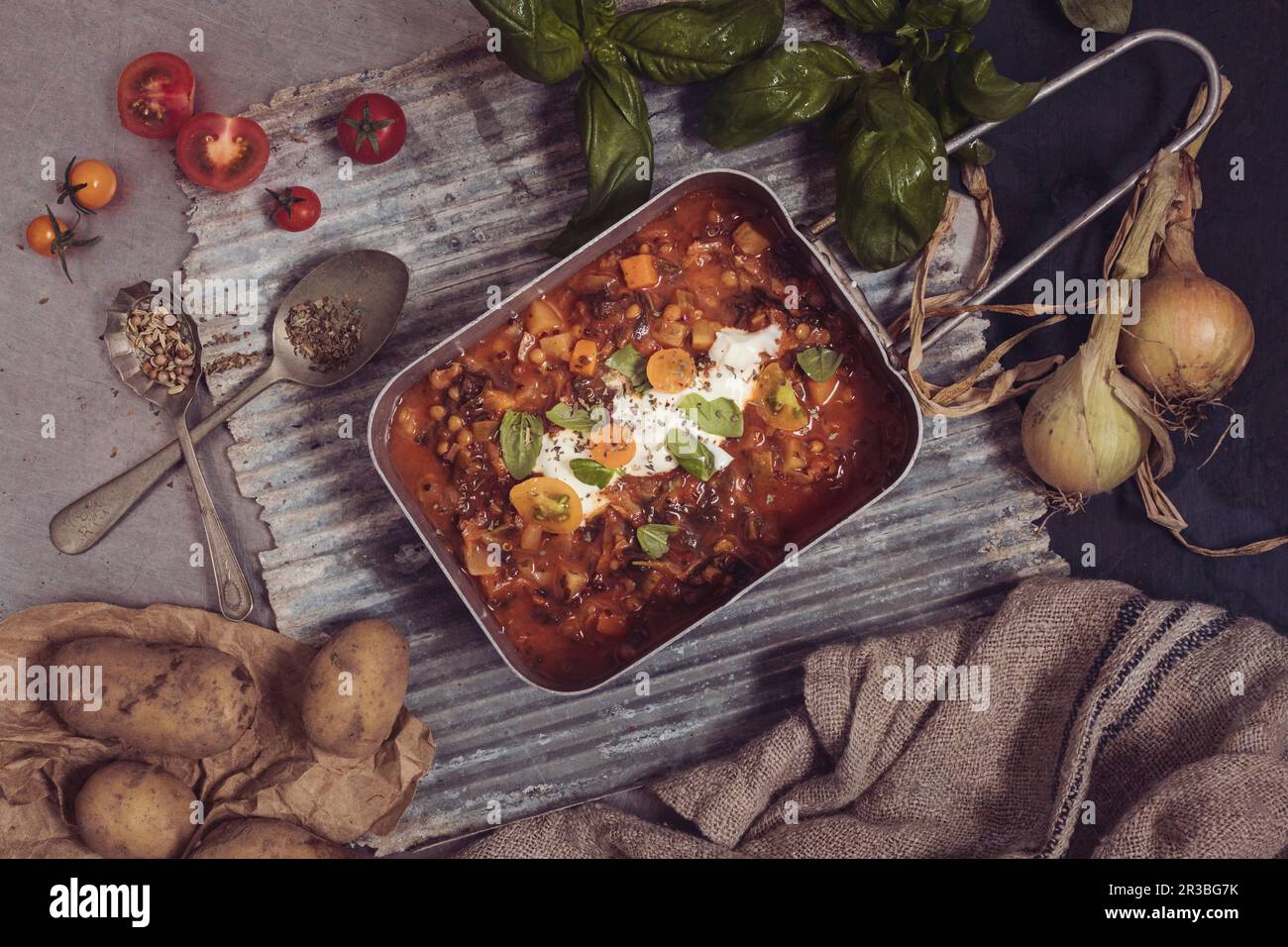 Spiced vegetable soup with soured cream Stock Photo - Alamy