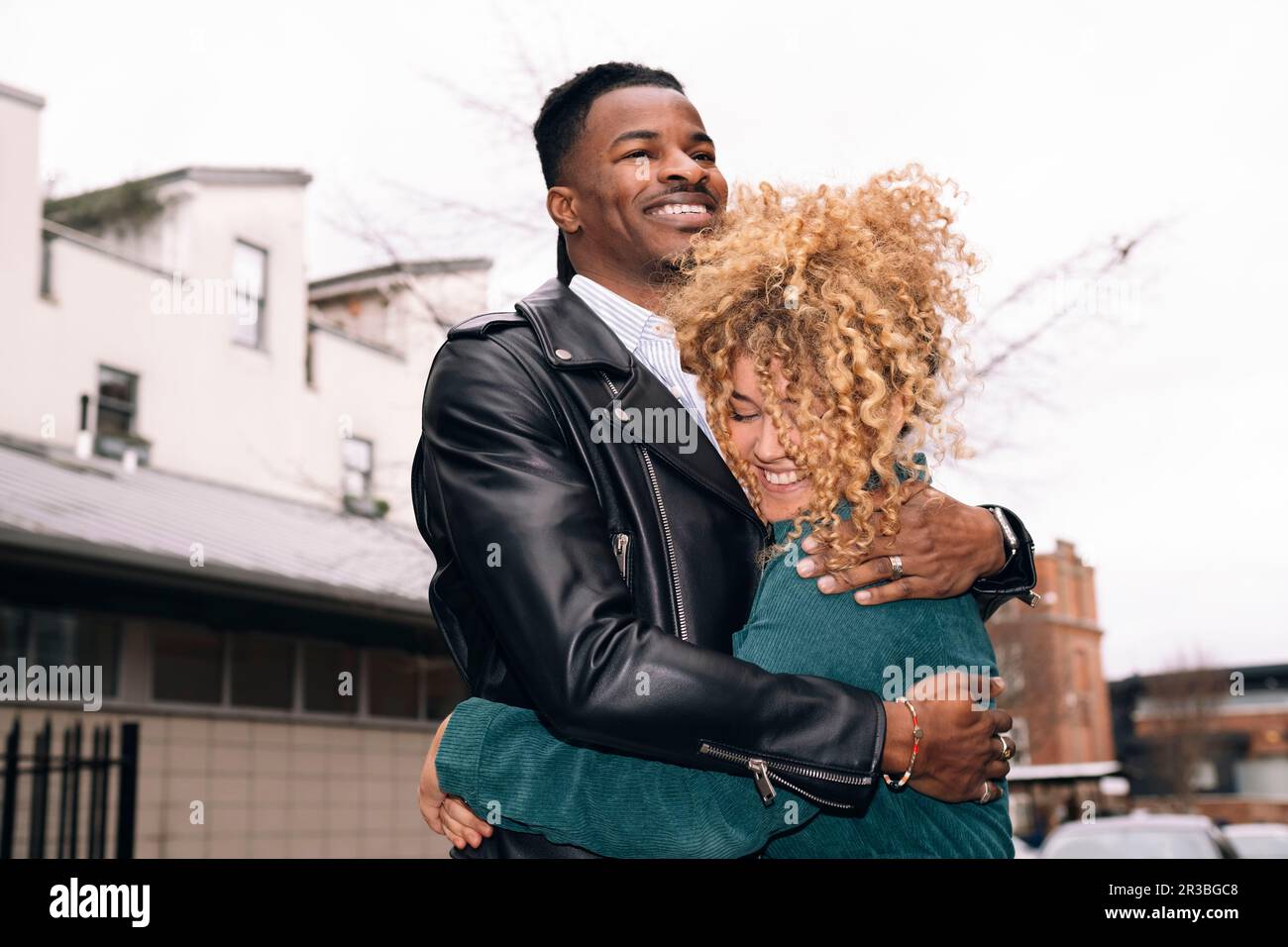 Male friends embracing other hi-res stock photography and images - Alamy