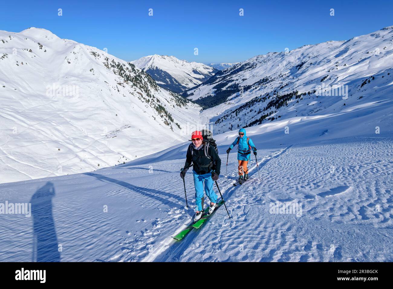 Austria, Tyrol, Two skiers in Kitzbuehel Alps Stock Photo - Alamy