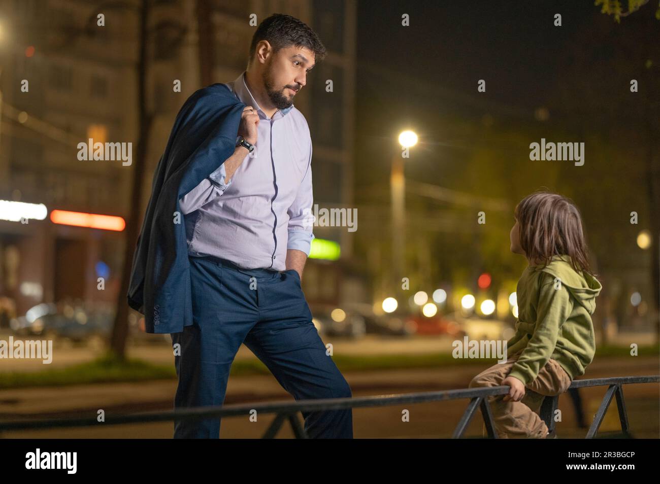People talking at night hi-res stock photography and images - Alamy