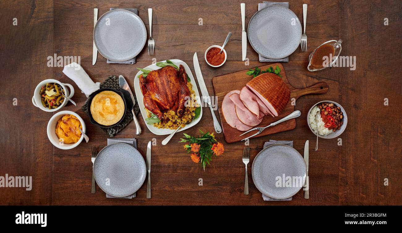 Festive menu with ham and poultry roast, side dishes and sauces Stock ...