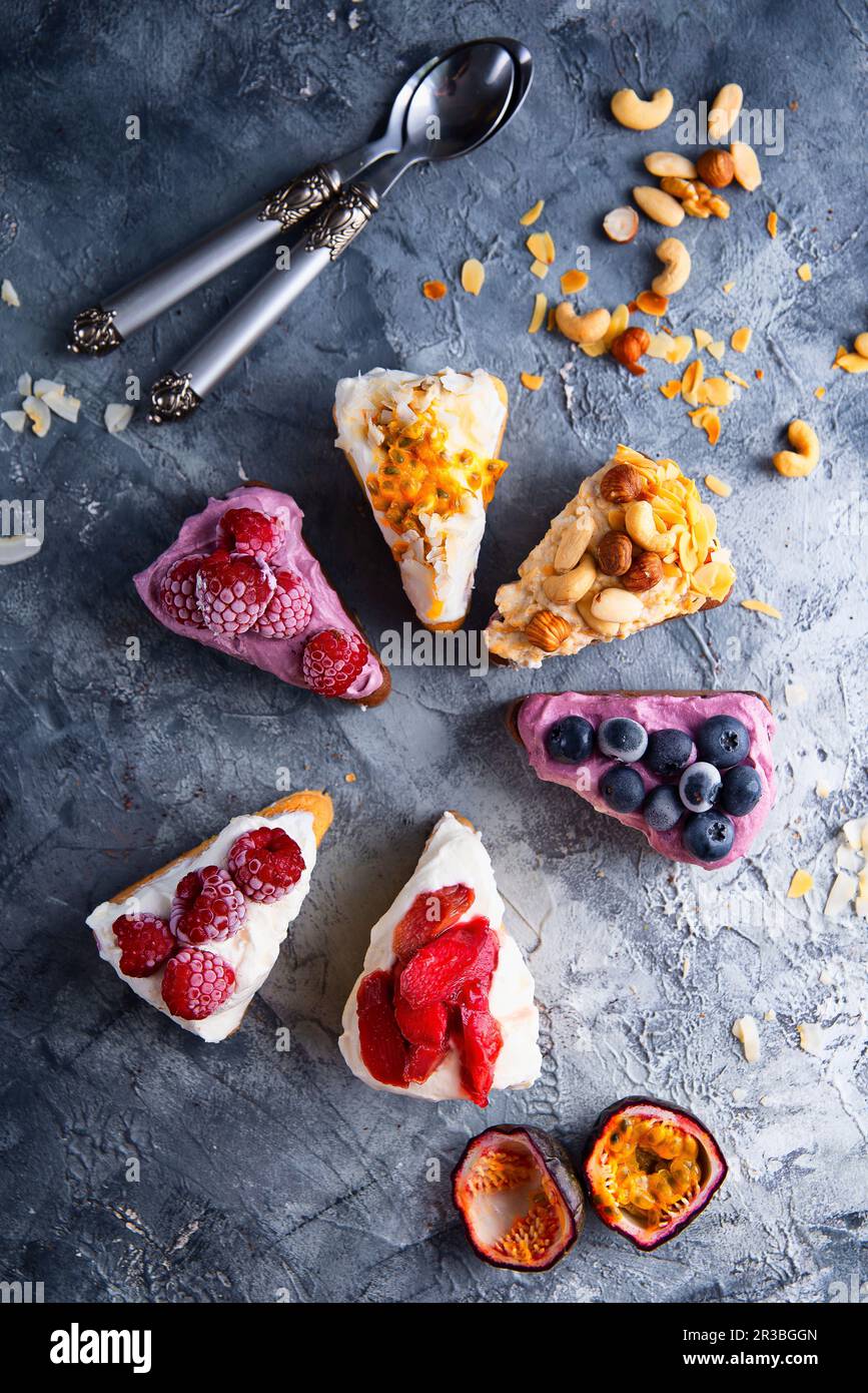 Sponge cake with multiflavored fruit cream and fruits Stock Photo - Alamy