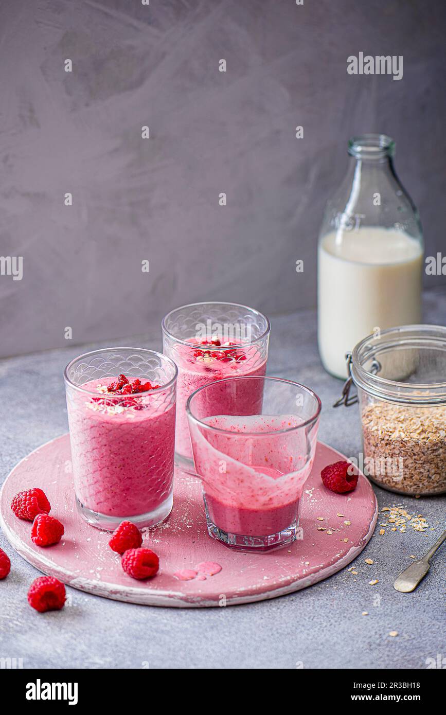 Drinking raspberry yoghurt with oats and vanilla Stock Photo - Alamy