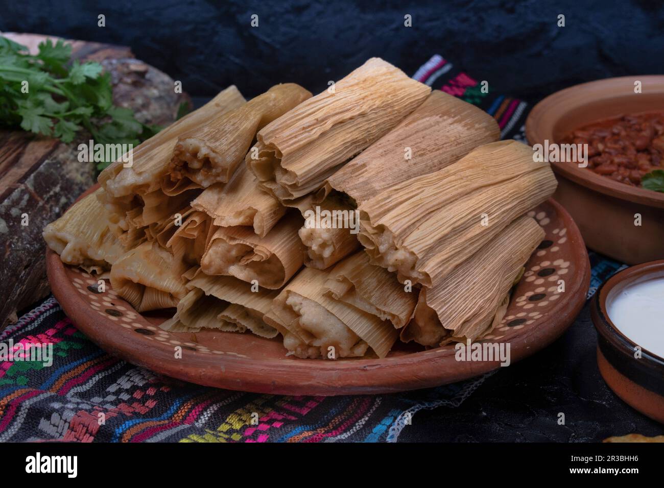 Vegan tamales filled with seitan, masa, chile verde and served with ...