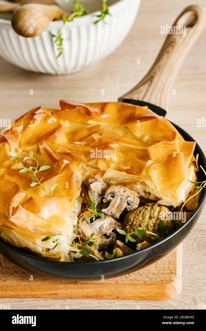 Vegan falafel with mushrooms topped with flaky and crispy filo dough ...
