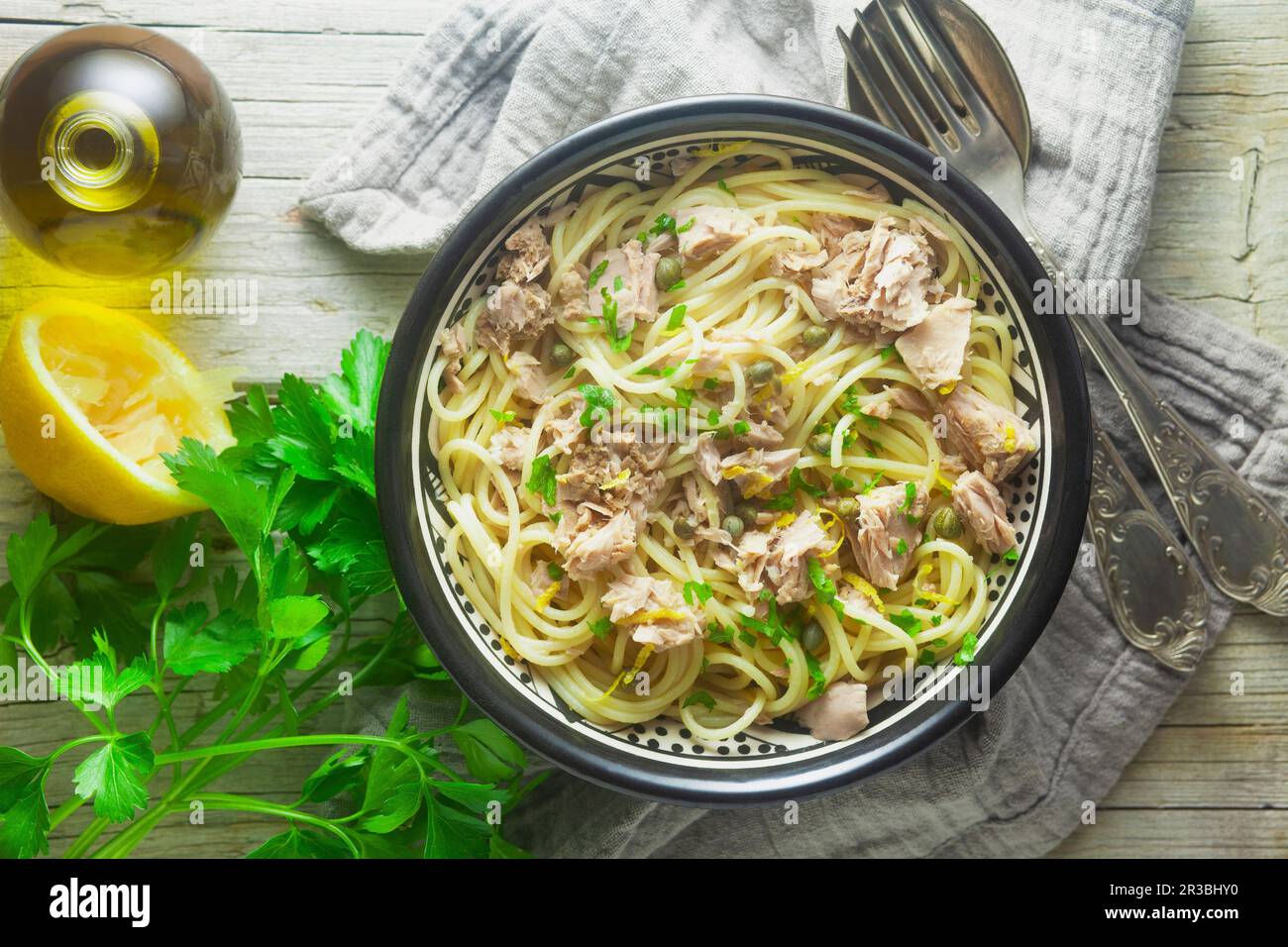 Spaghetti with tuna, lemon and capers Stock Photo - Alamy