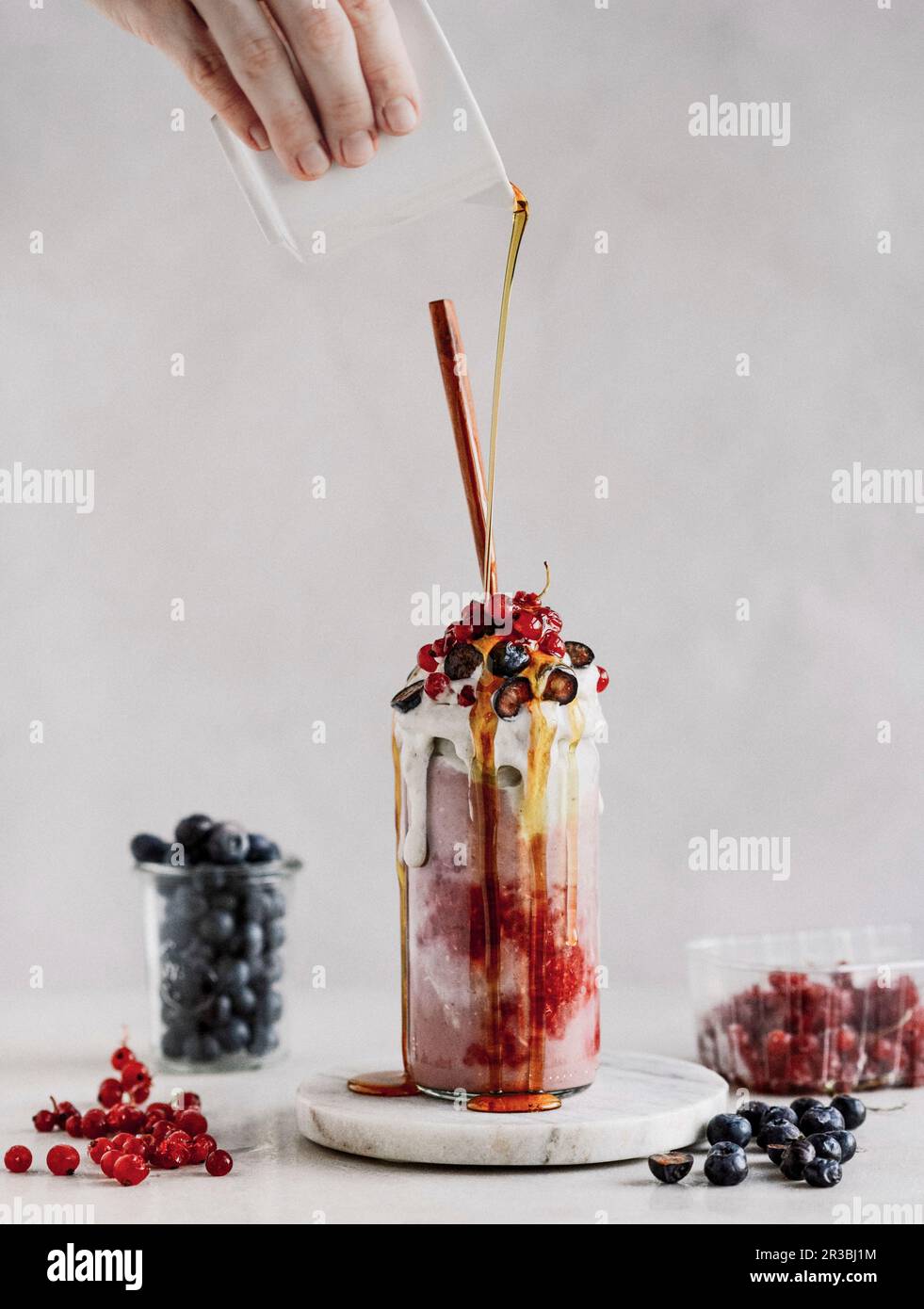 Fruit dessert topped with maple syrup Stock Photo - Alamy