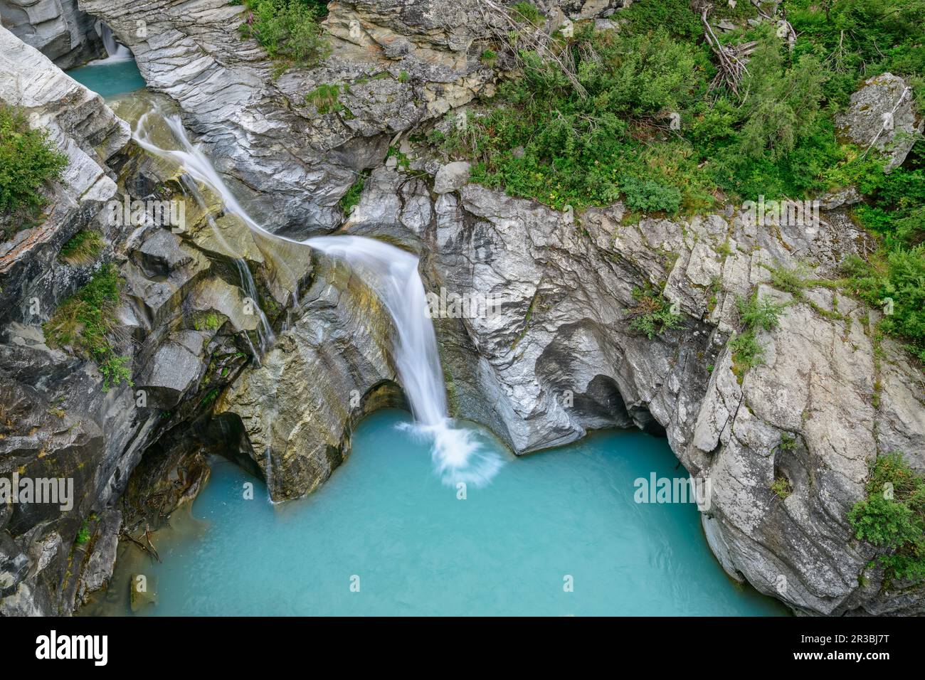 Arc stream flowing into alpine pool vanoise national park hi-res stock ...