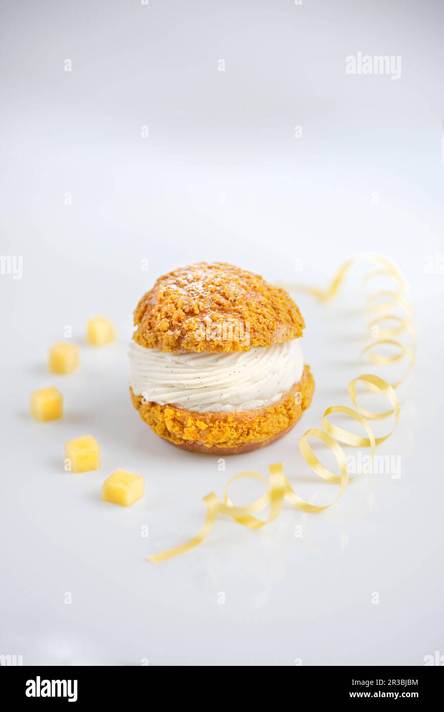 Classic French Choux au Craquelin with a piped vanilla cream Stock ...