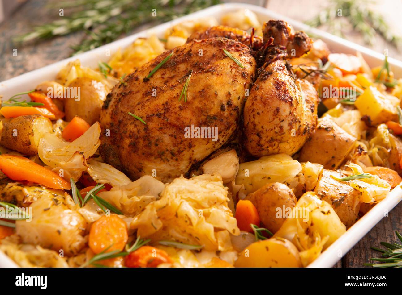 Grilled chicken on a bed of vegetables Stock Photo - Alamy