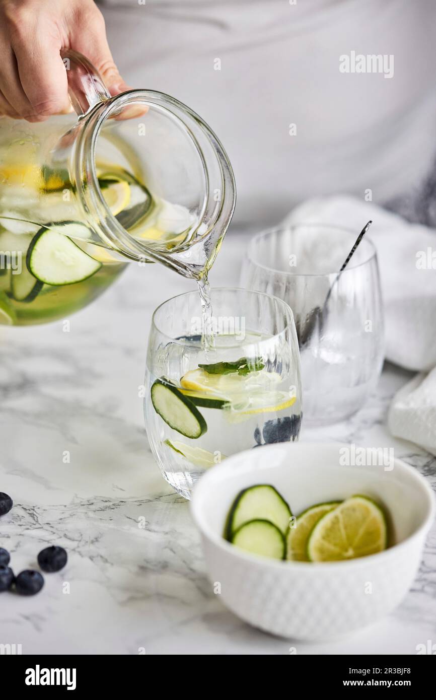 Pouring bottled water hi-res stock photography and images - Alamy