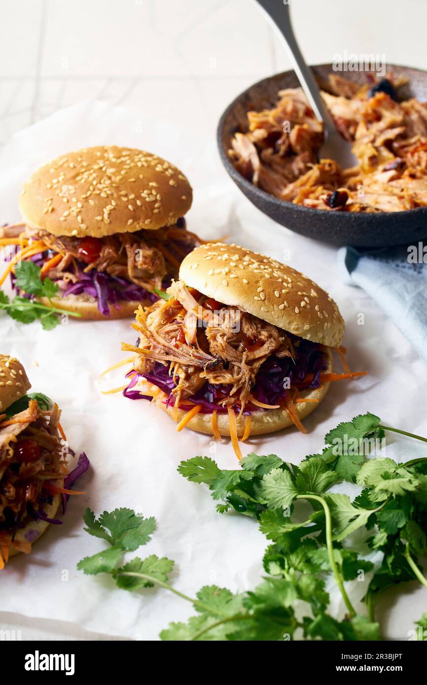 Pulled pork burgers with pickled and fresh vegetables Stock Photo - Alamy