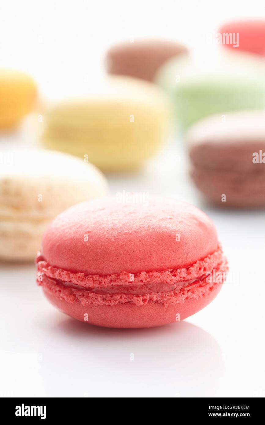 Colorful macaron cookies arranged in shape of emoji smile Stock Photo ...