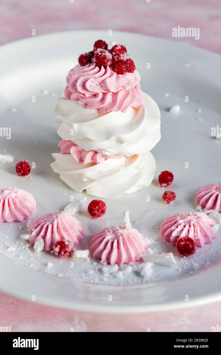 Cranberry meringue individual mini cake Stock Photo - Alamy