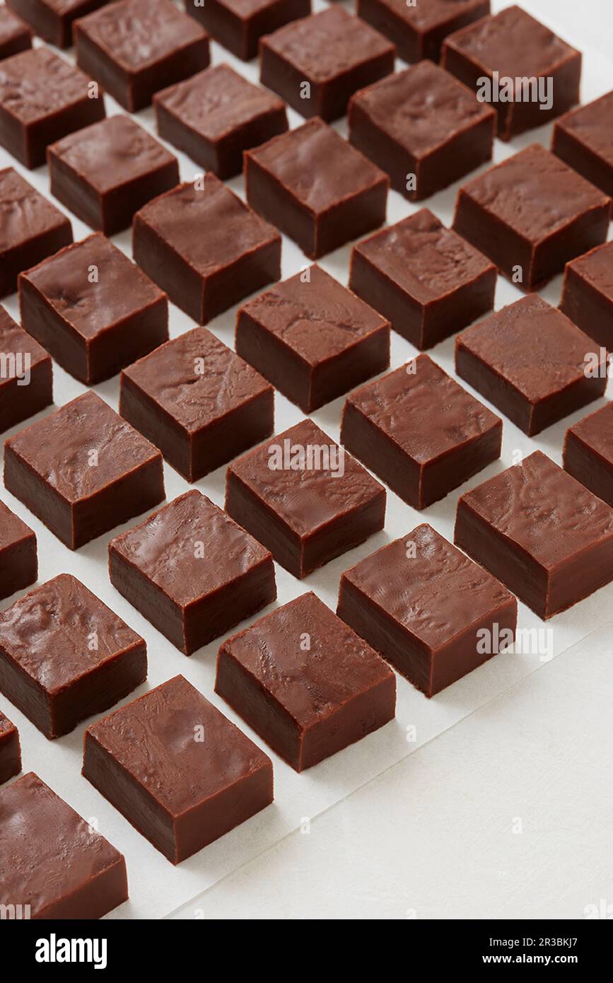 Caramel cubes in rows Stock Photo - Alamy