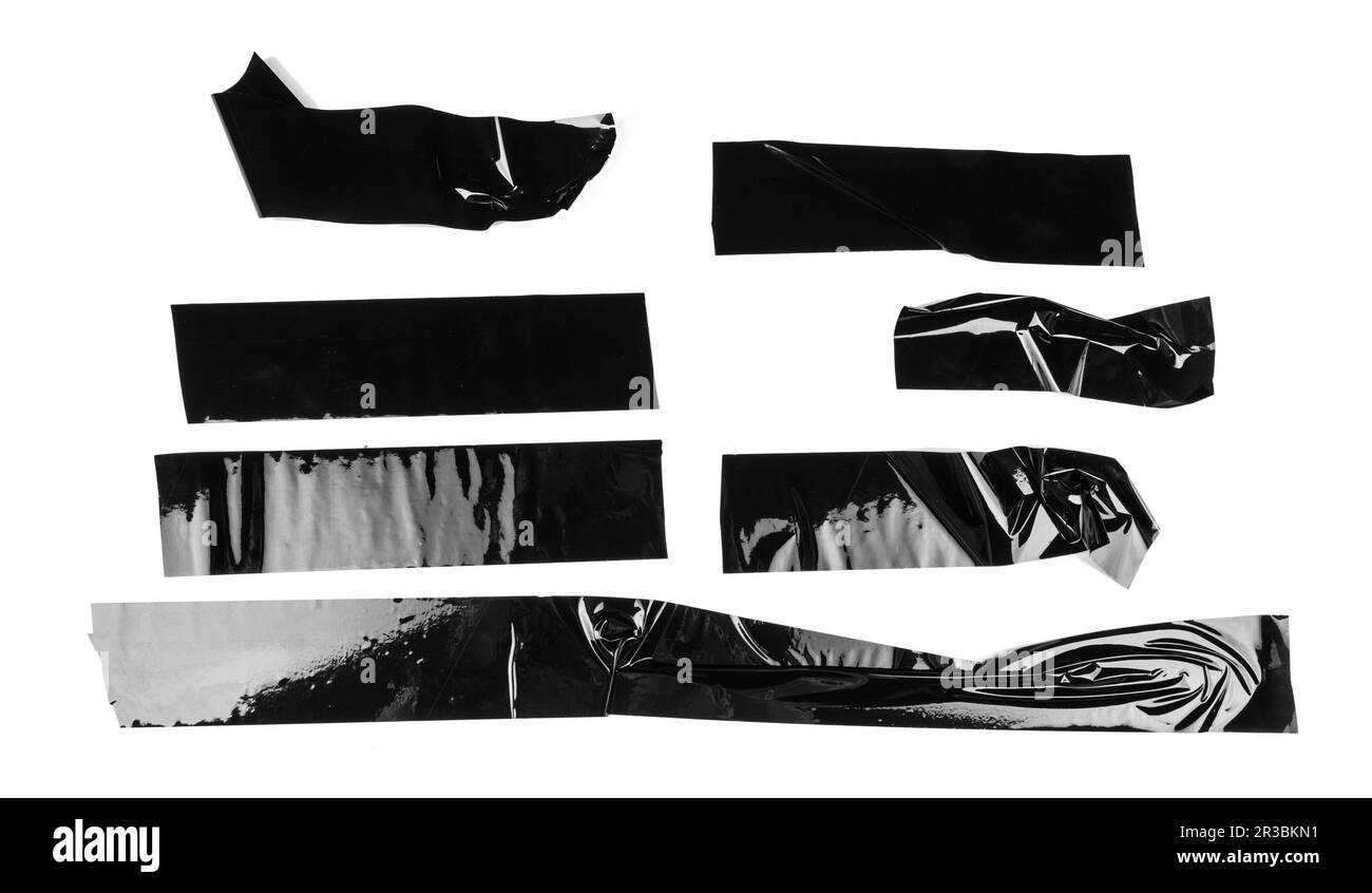 Torn different size black sticky tape, adhesive pieces Stock Photo - Alamy