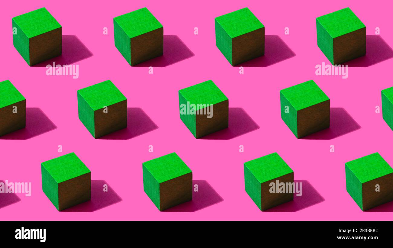 3D pattern of green cubes against pink background Stock Photo - Alamy