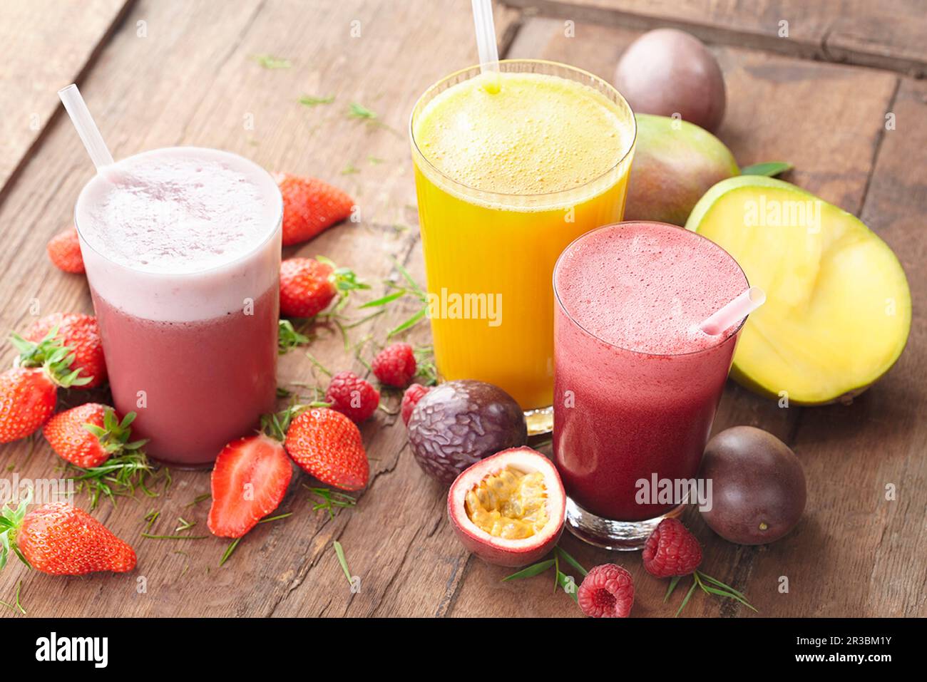 Three different fruit smoothies Stock Photo - Alamy