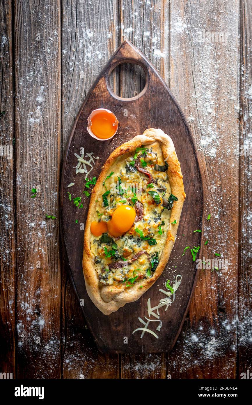 Khachapuri (gratin cheese bread with egg, Georgia Stock Photo - Alamy