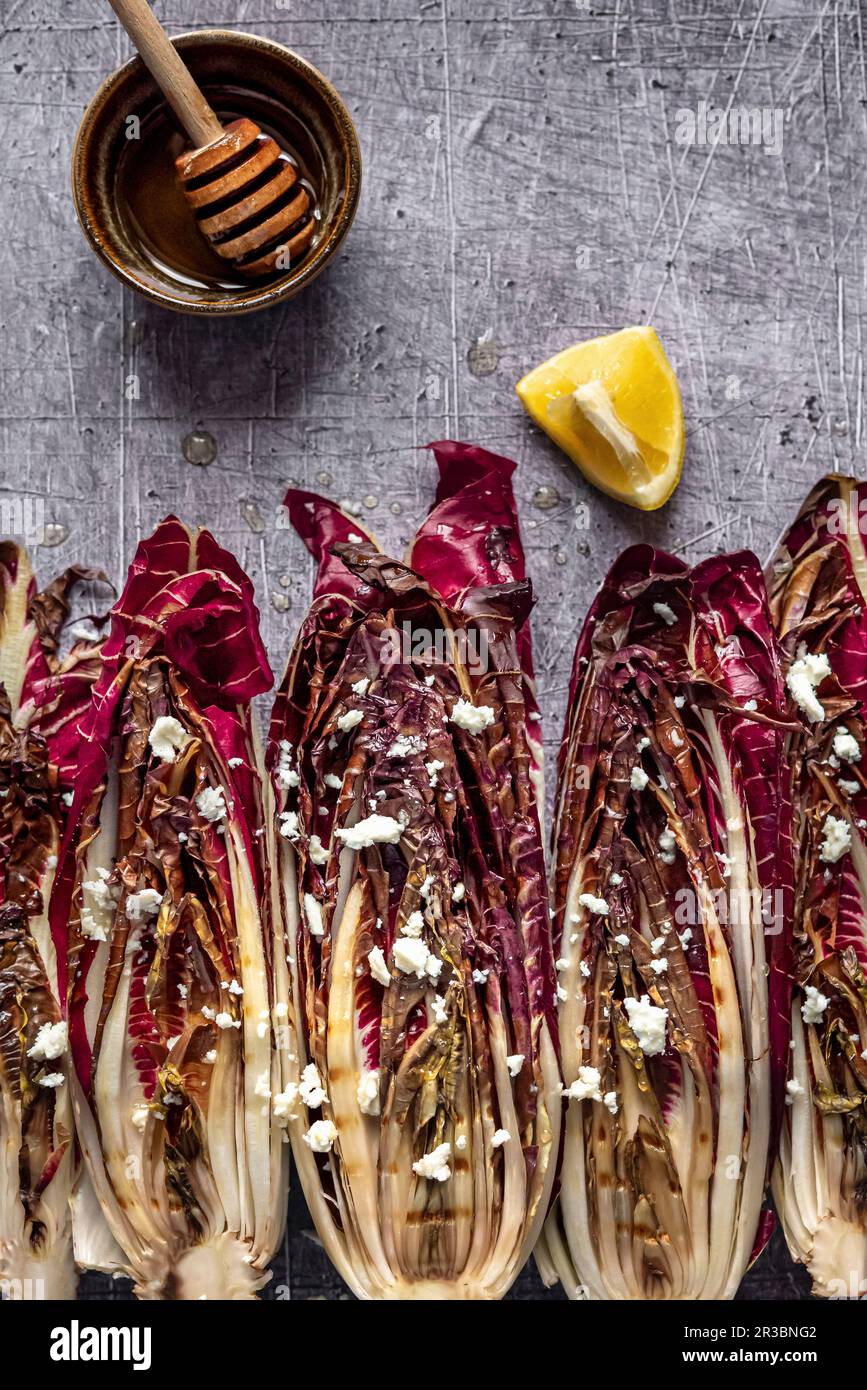 Grilled Red Chicory with Feta Cheese and Honey Lemon dressing Stock ...