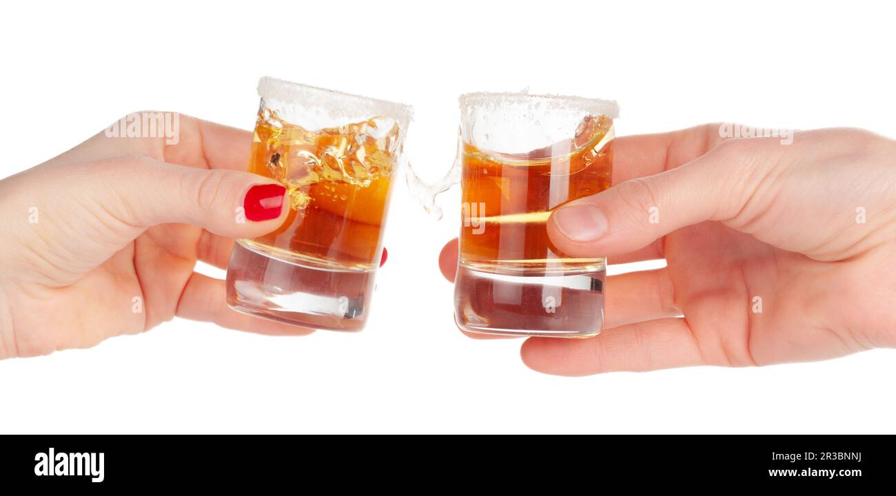 Hands toasting shots hi-res stock photography and images - Alamy