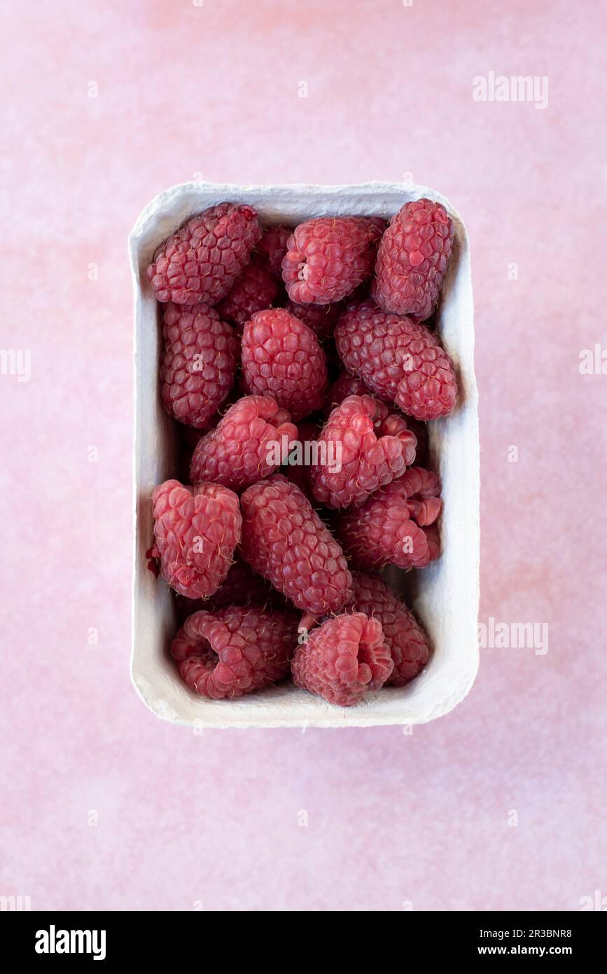 Fresh raspberries in paper hi-res stock photography and images - Alamy
