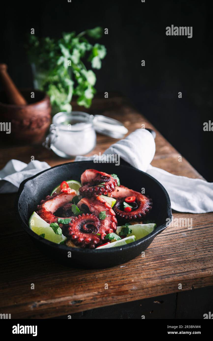 Grilled Octopus with Lime and Chilli Stock Photo - Alamy