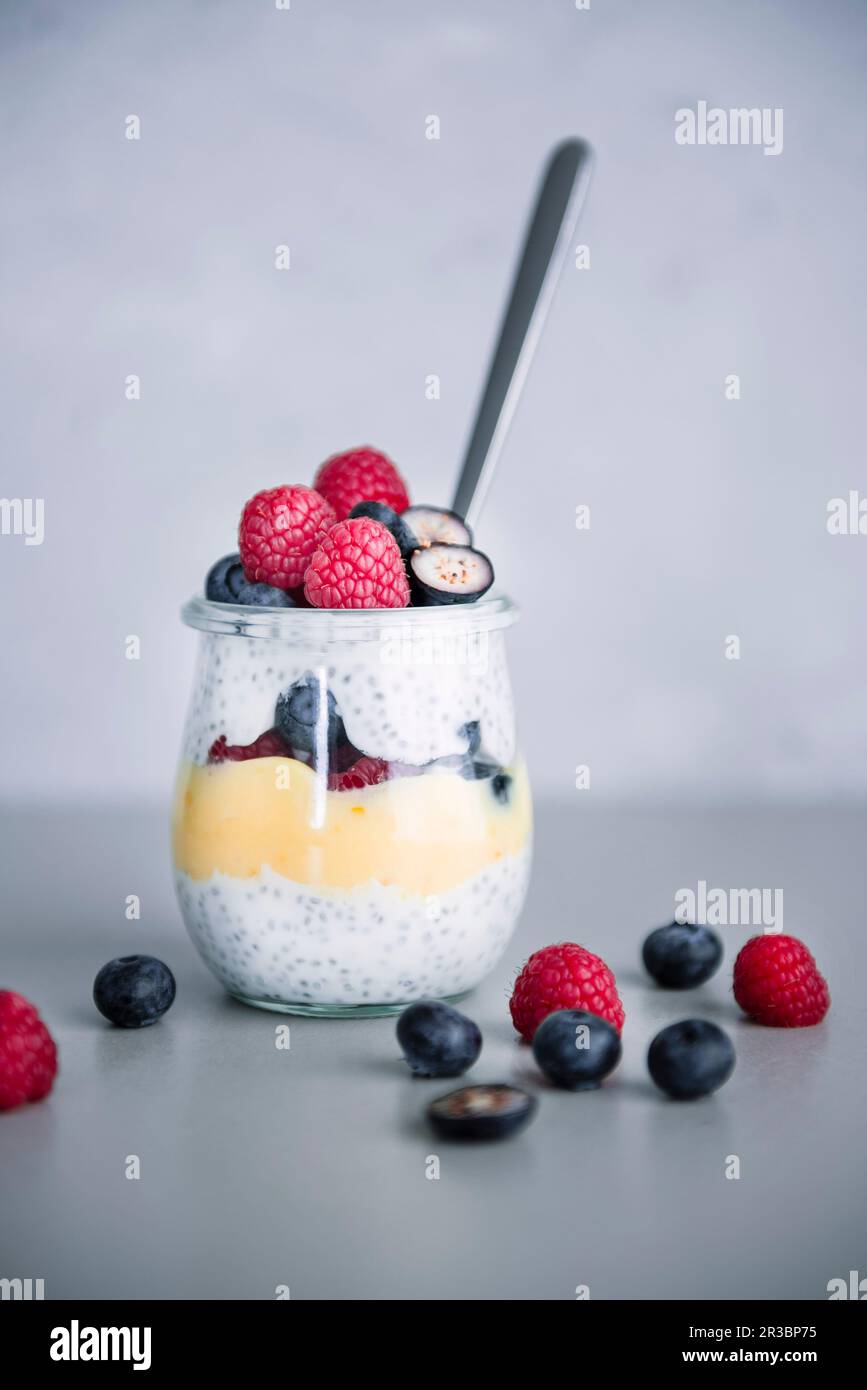 Skyr Chia Pudding with Lemon Curd and Berries Stock Photo - Alamy