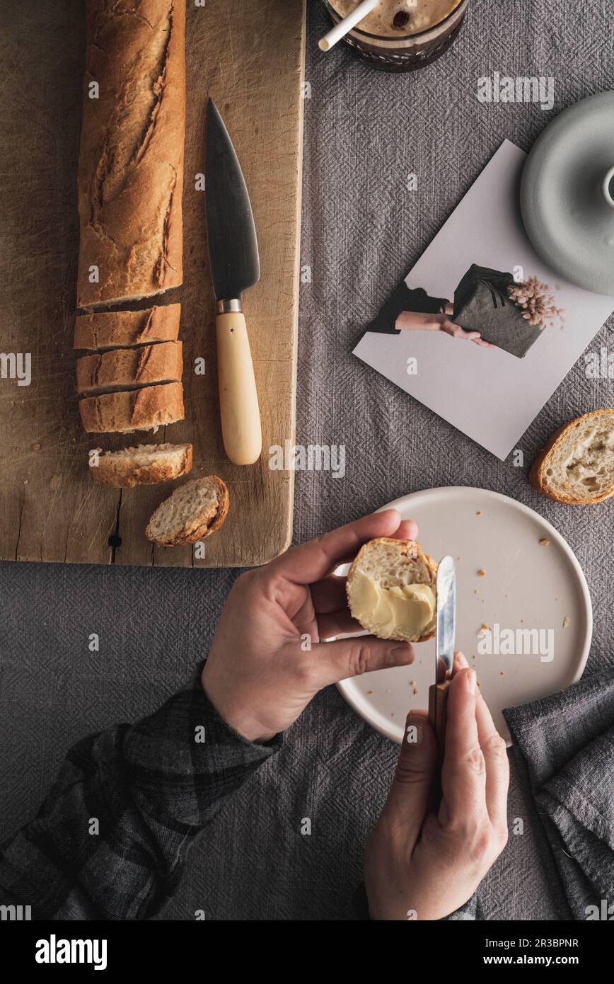 Person spreading bread butter hi-res stock photography and images - Alamy