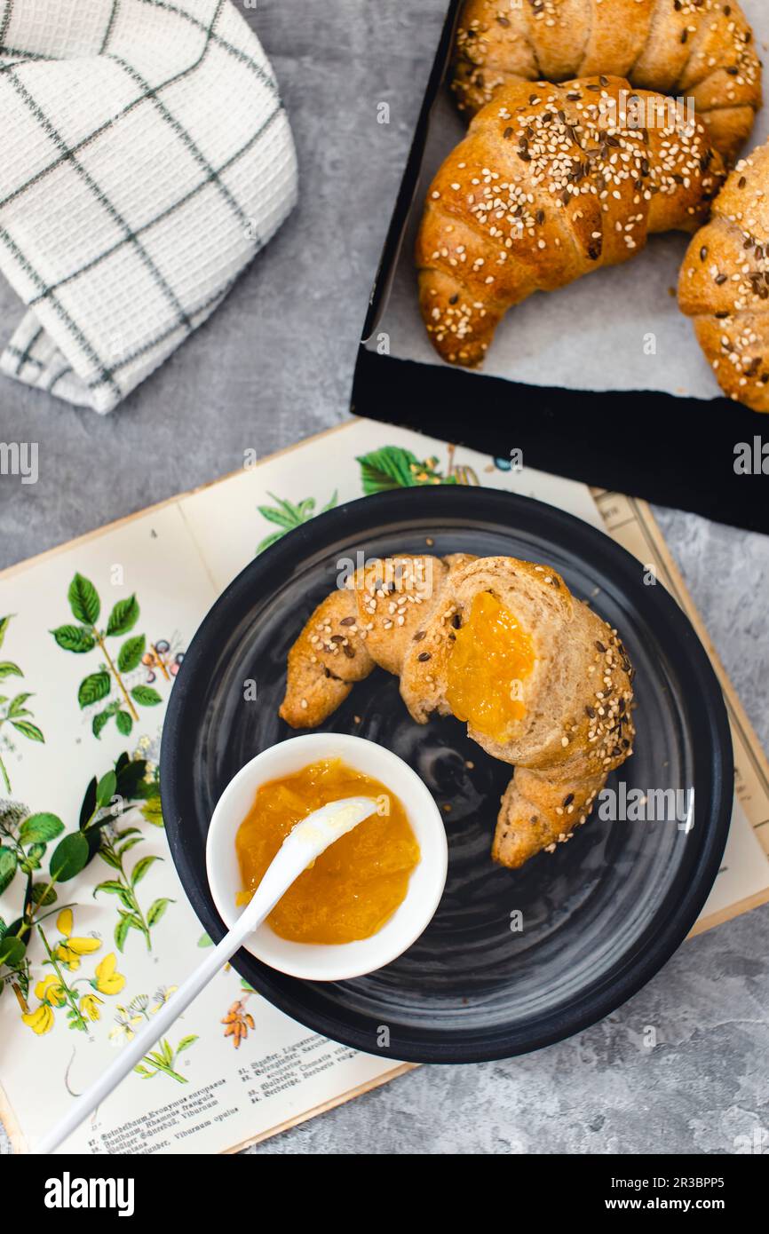 sesame croissants with mango jam Stock Photo - Alamy