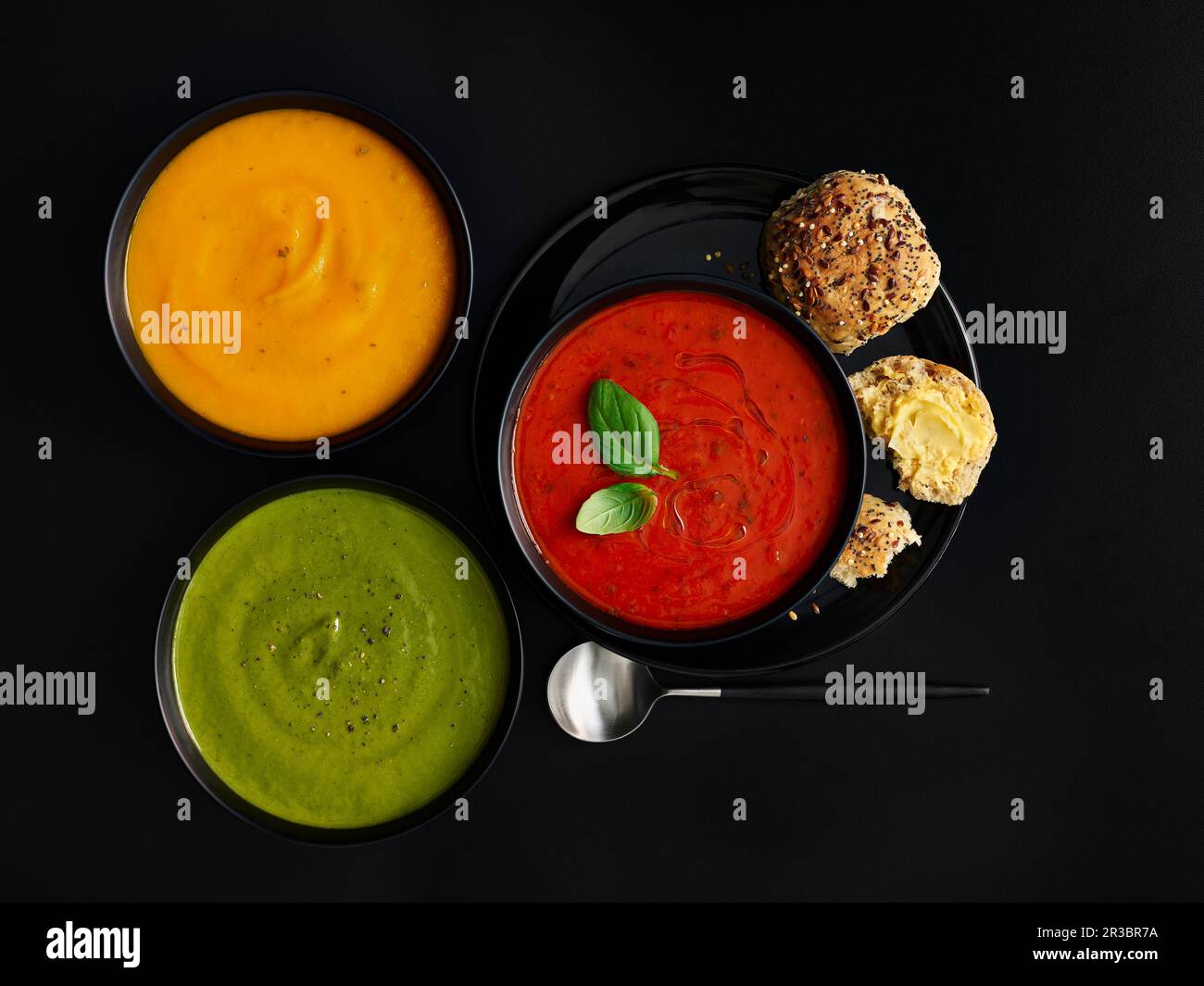 Three different colored cream soups Stock Photo - Alamy