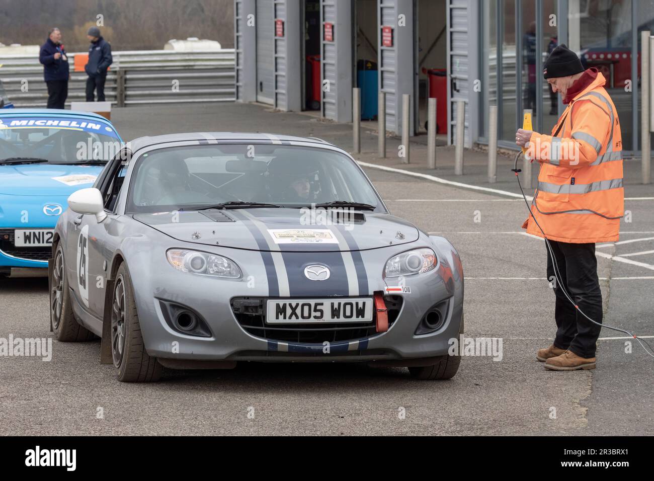 Nigel and Catherine Brain in their Mazda MX5 with the control point ...