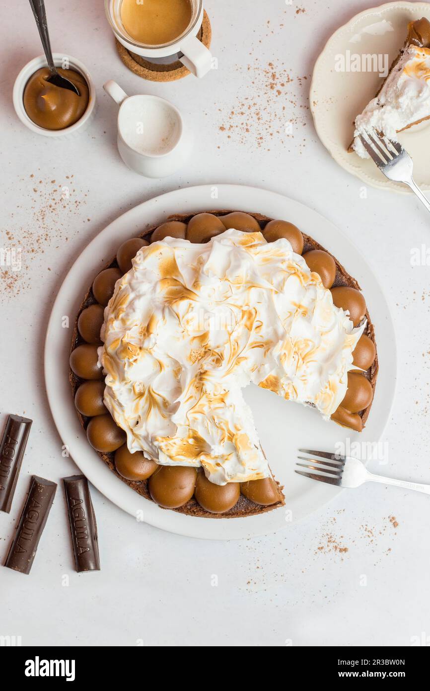 Brownie cake with meringue and dulce de leche Stock Photo - Alamy