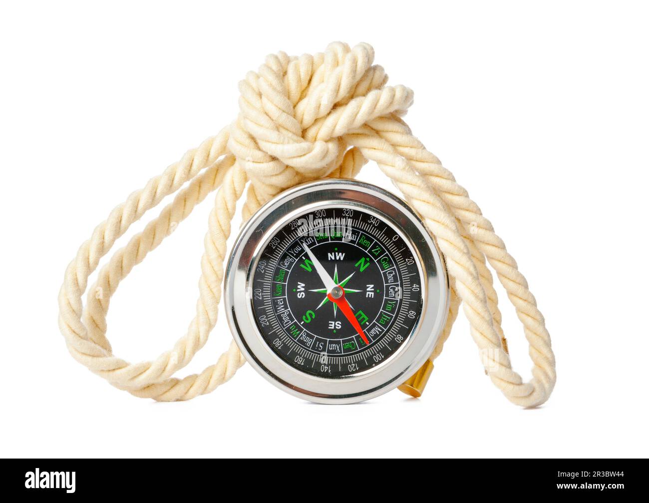 Nautical compass with rope isolated on white background Stock Photo - Alamy