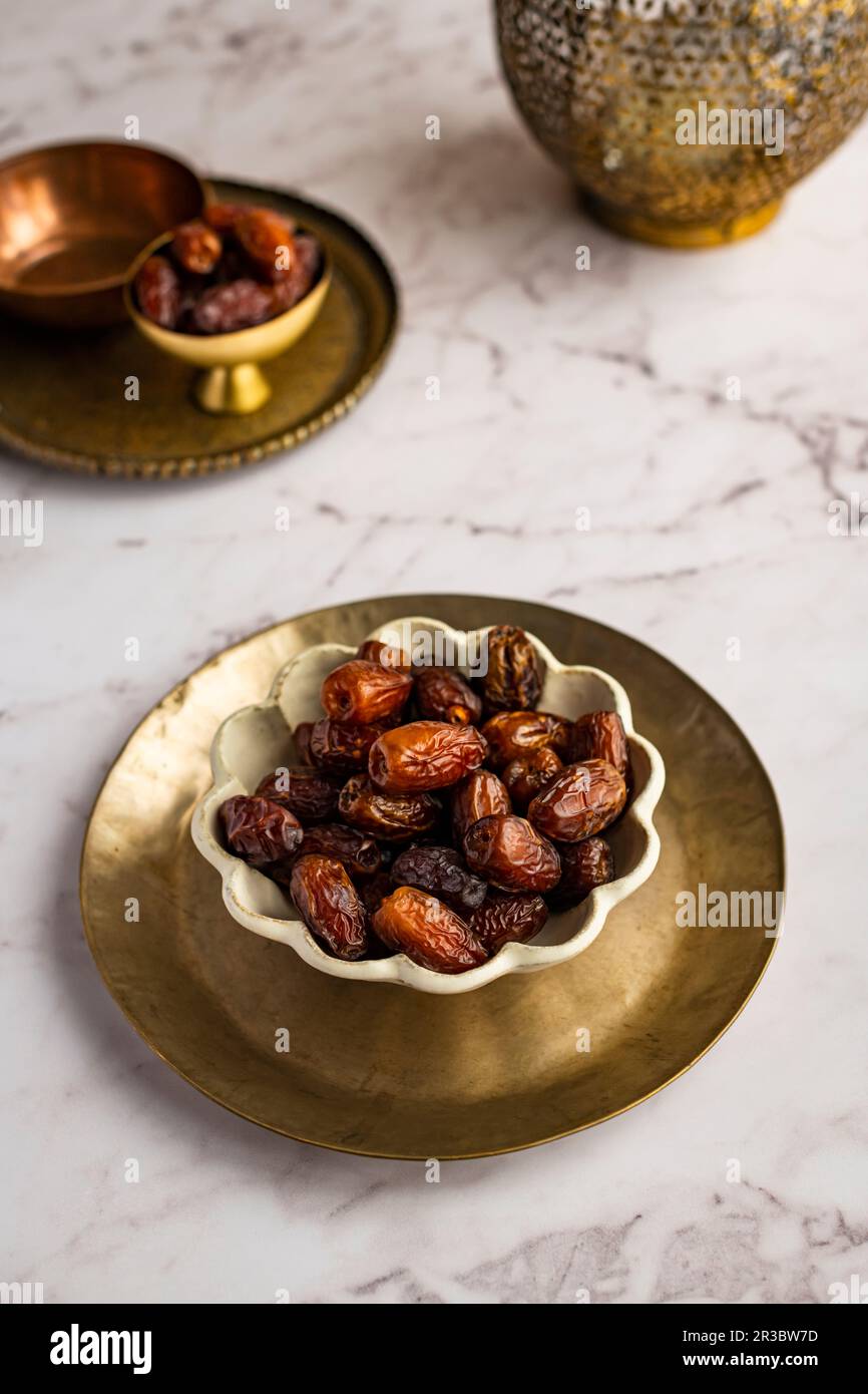 Fresh dates on plate hi-res stock photography and images - Alamy