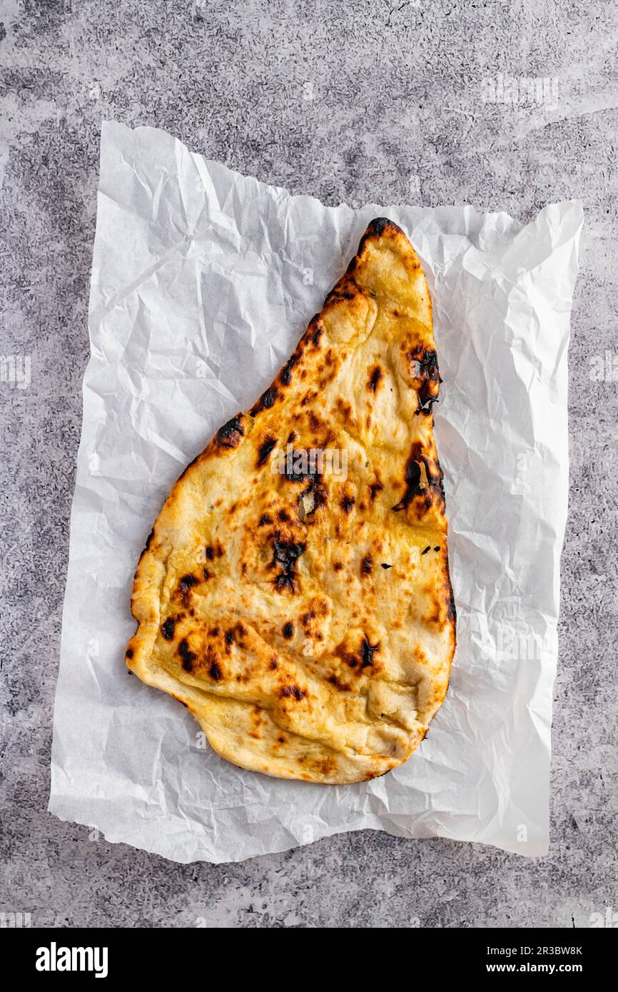 Butter Naan baked in Tandoori Oven Stock Photo - Alamy