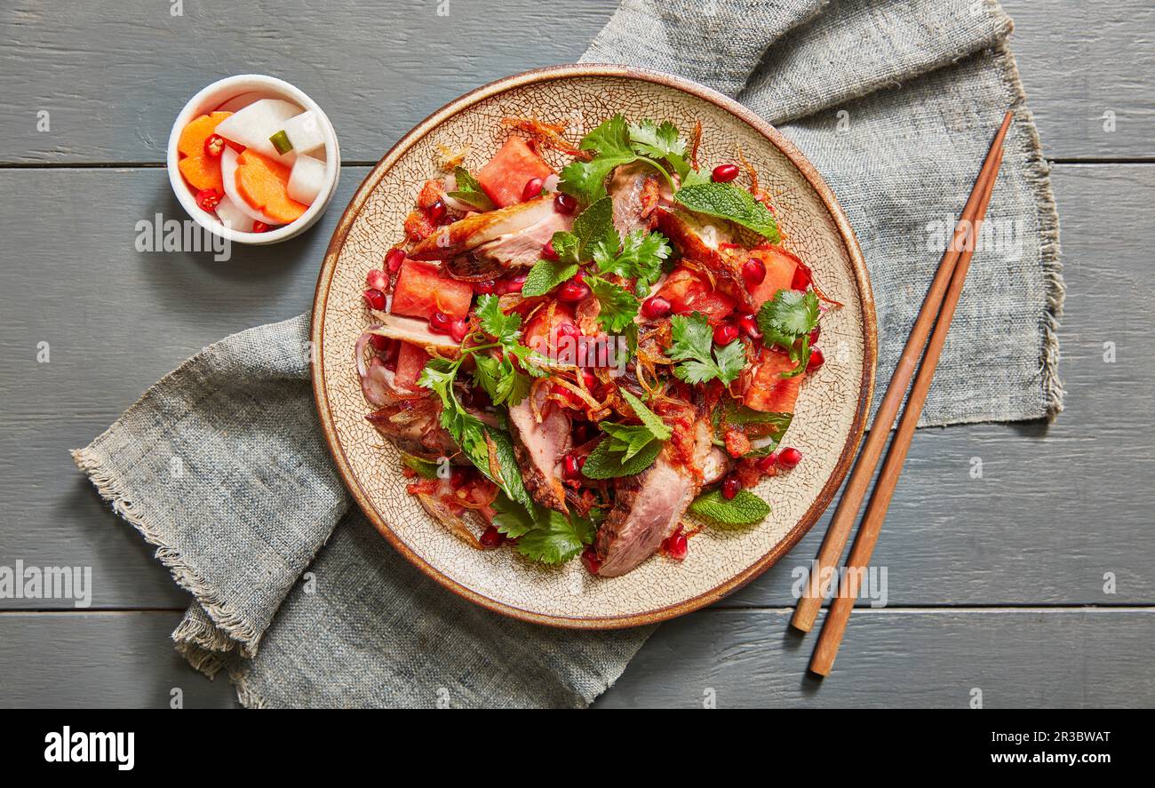 Smoked Duck Salad with Bell Pepper and Coriander Stock Photo - Alamy