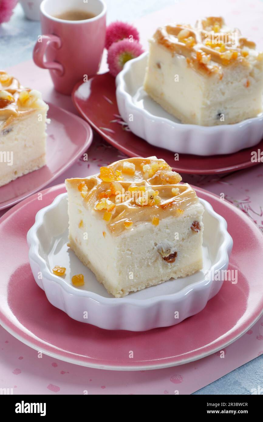 Pieces of cheesecake with raisins and orange peel Stock Photo - Alamy