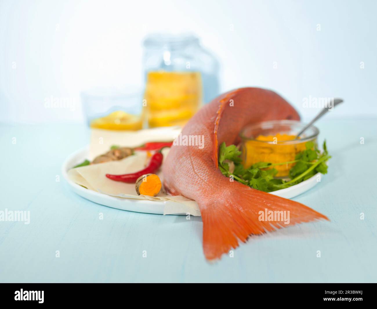 Whole Red Snapper Fish On Plate with Ingredients Stock Photo - Alamy