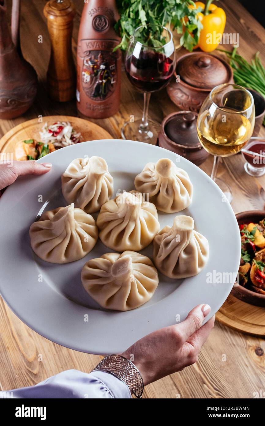 Georgian dumplings khinkali with meat hi-res stock photography and ...