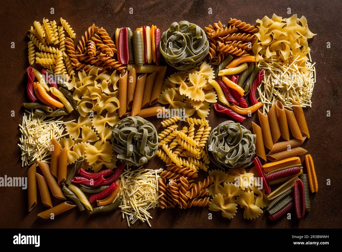 Sorted pasta in different shapes and colours Stock Photo - Alamy