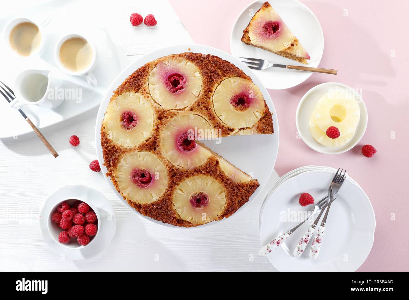 Pineapple and raspberry upside down cake Stock Photo - Alamy