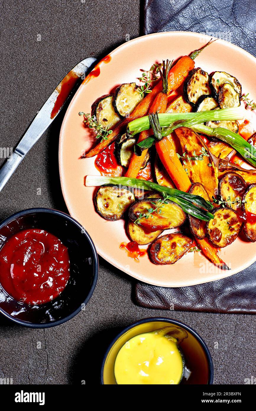 Fried vegetables with ketchup and saffron mayonnaise Stock Photo - Alamy